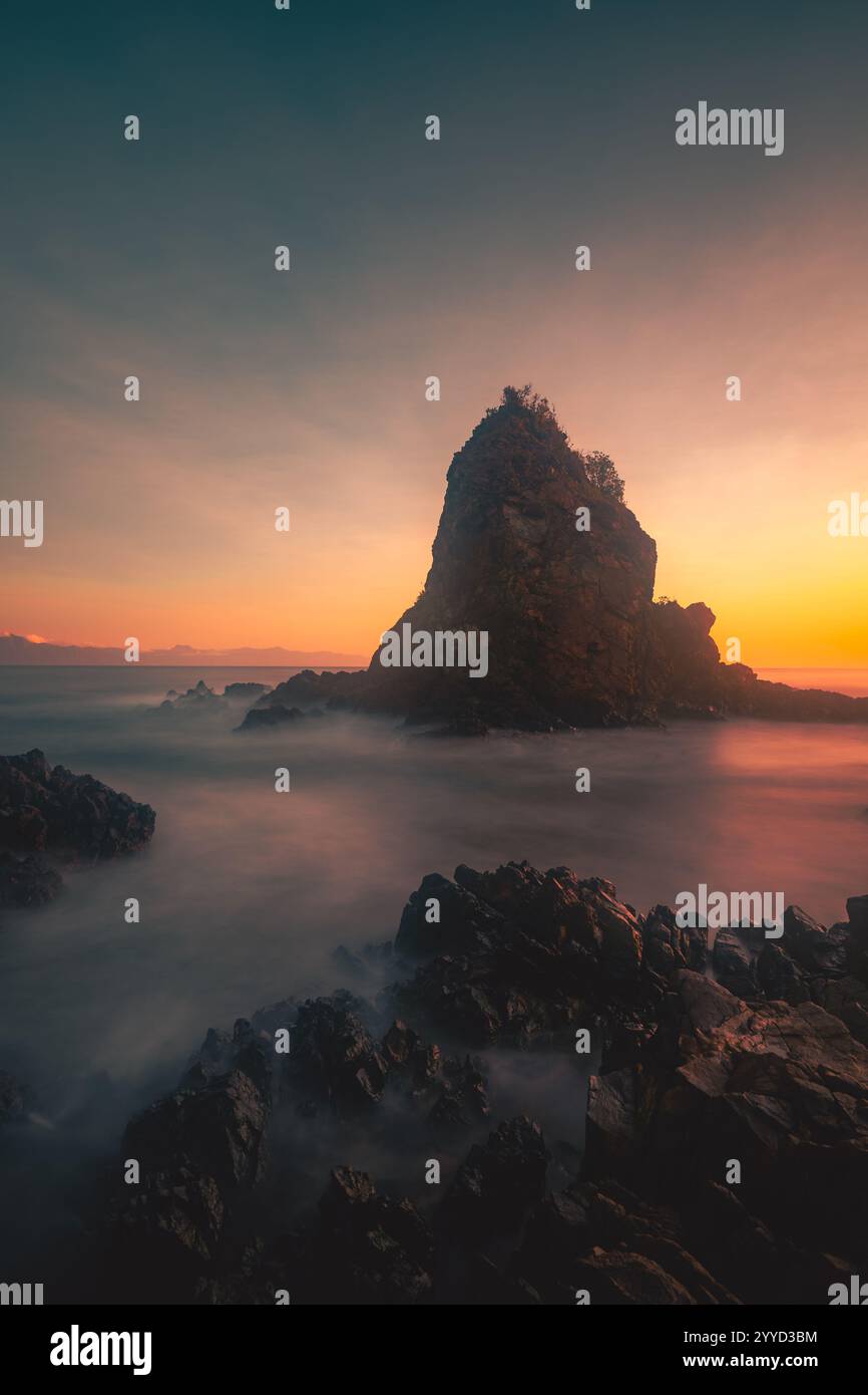 A breathtaking view of Diguisit Rock Formation at sunset, where rugged ...