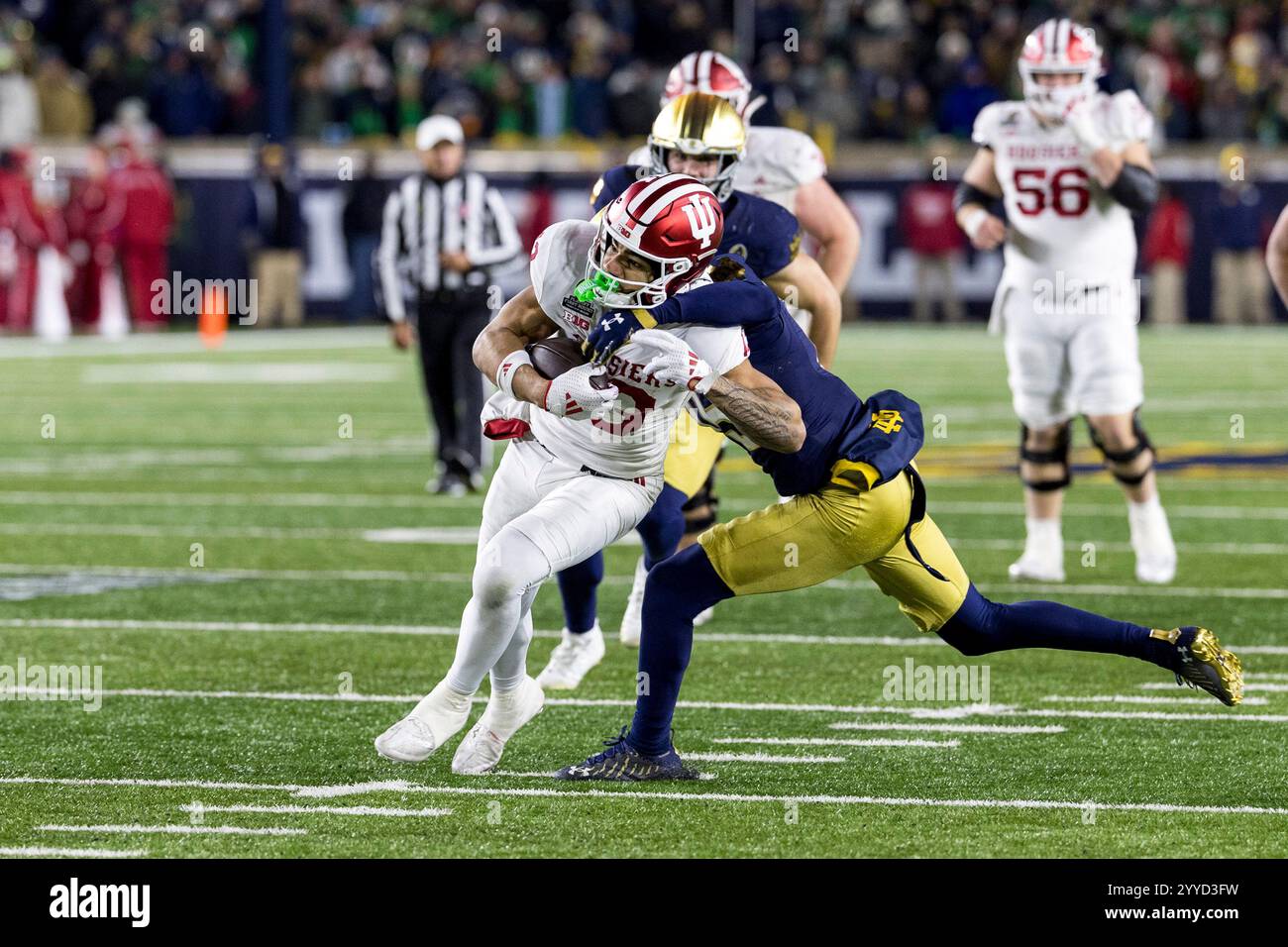 South Bend, Indiana, USA. 20th Dec, 2024. Indiana wide receiver Elijah Sarratt (13) runs with ...