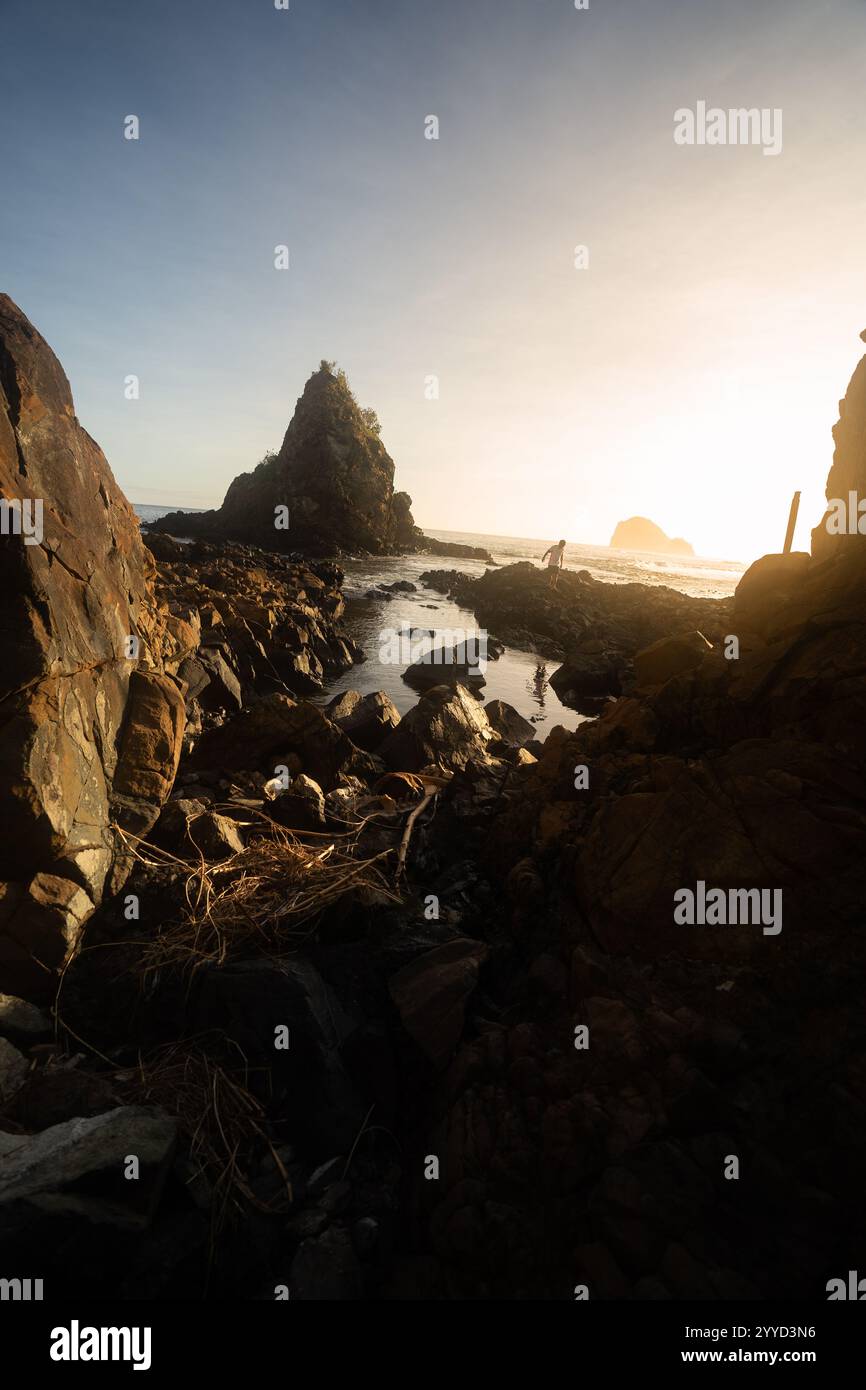 A breathtaking view of Diguisit Rock Formation at sunset, where rugged ...