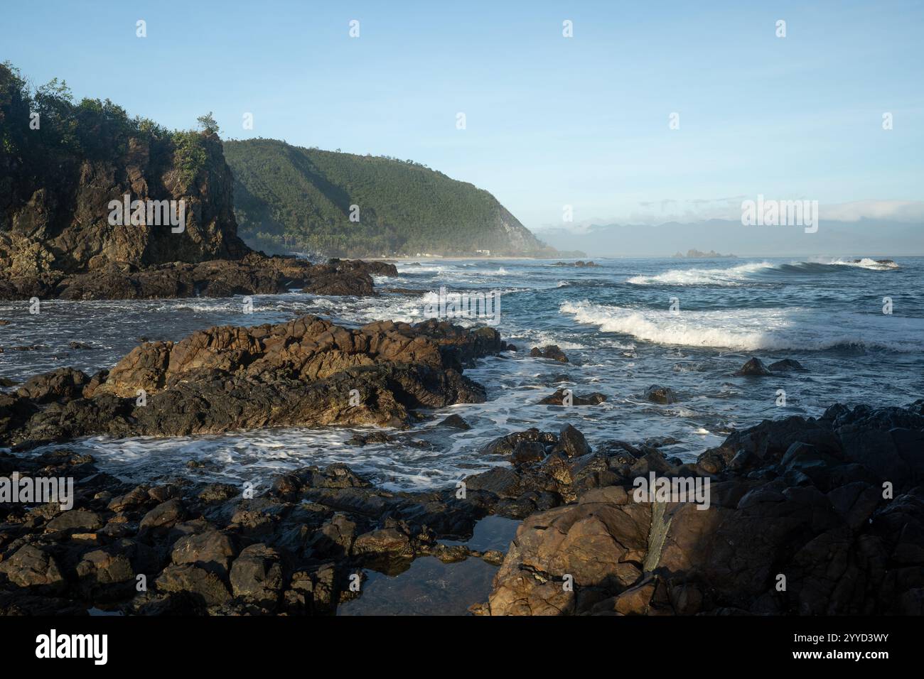 A breathtaking view of Diguisit Rock Formation at sunset, where rugged ...