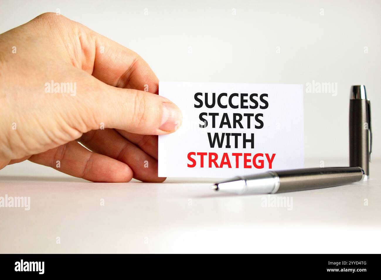 Success starts with strategy symbol. Concept words Success starts with ...