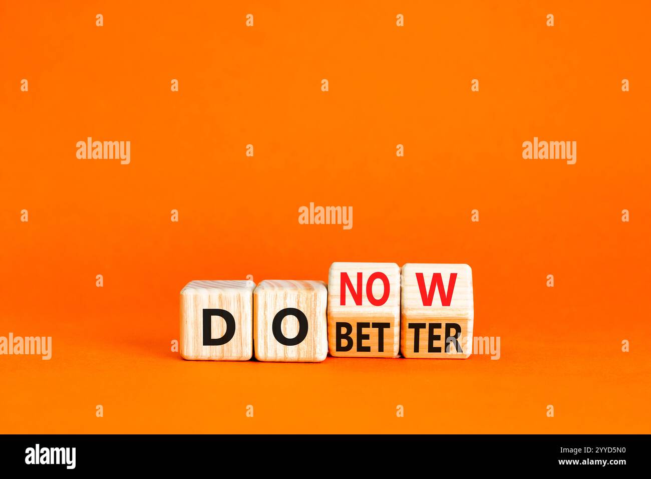 Do better and now symbol. Concept words Do better Do now on wooden ...