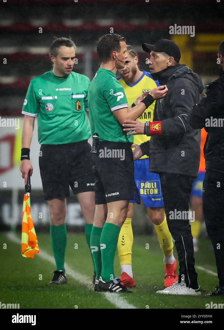 Sint Truiden, Belgium. 21st Dec, 2024. referee Kevin Van Damme and STVV ...