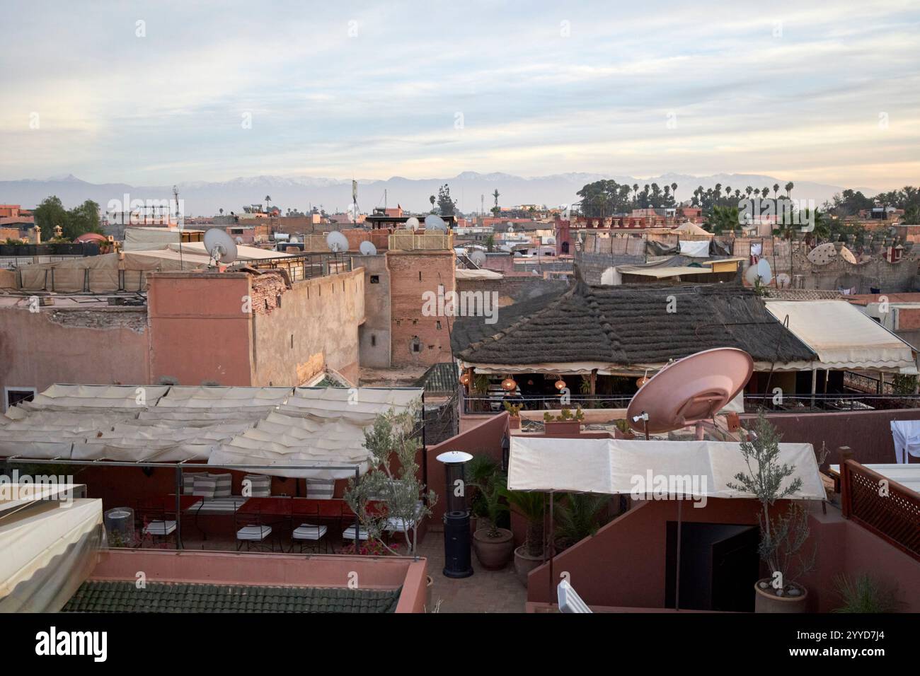 view over the rooftops of the old city medina of marrakesh towards the ...