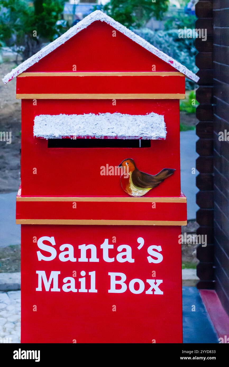 Festive Red Santa Mailbox With Snowy Roof and Decorative Robin Stock ...