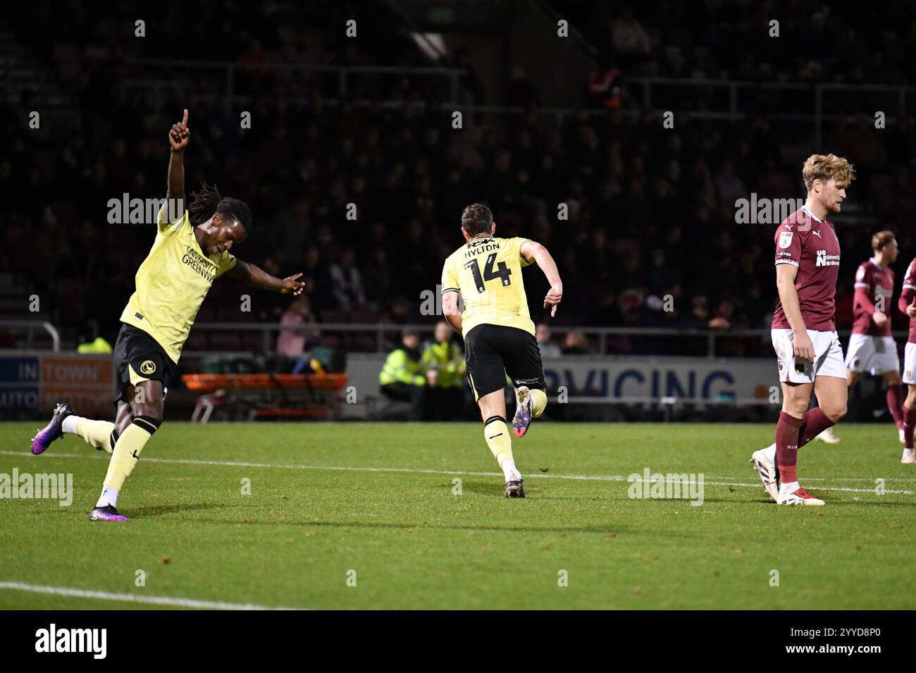 Northampton, England. 21st Dec 2024. Danny Hylton celebrates with Karoy ...
