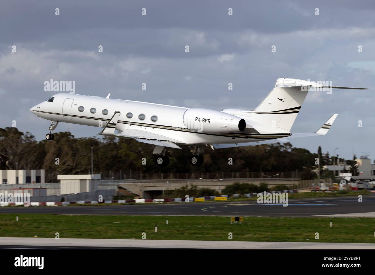 Gulfstream G550 (REG: P4-BFR) backtracking runway 31 for departure ...