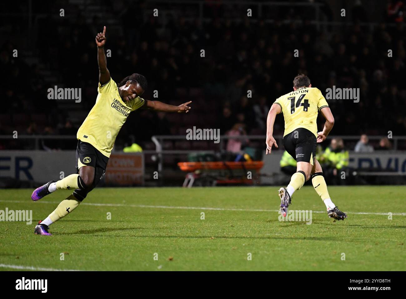 Northampton, England. 21st Dec 2024. Danny Hylton celebrates with Karoy ...