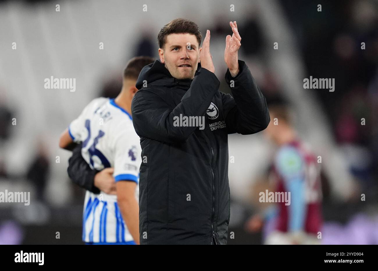 Brighton and Hove Albion manager Fabian Hurzeler applauds the fans ...
