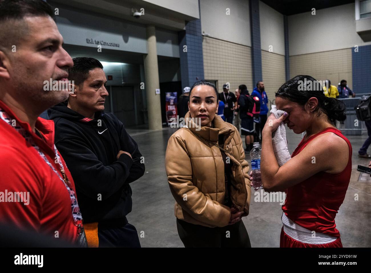 Richmond, Virginia, USA. 19th Dec, 2024. Airam Solis is consoled by her ...