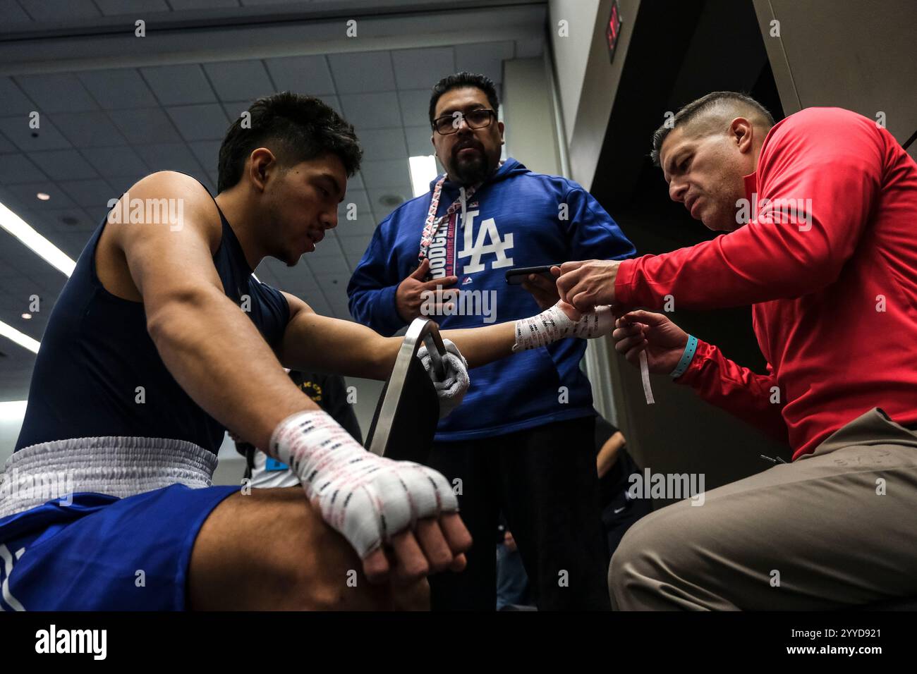 Richmond, Virginia, USA. 19th Dec, 2024. Coach Julian Cortez wraps the ...
