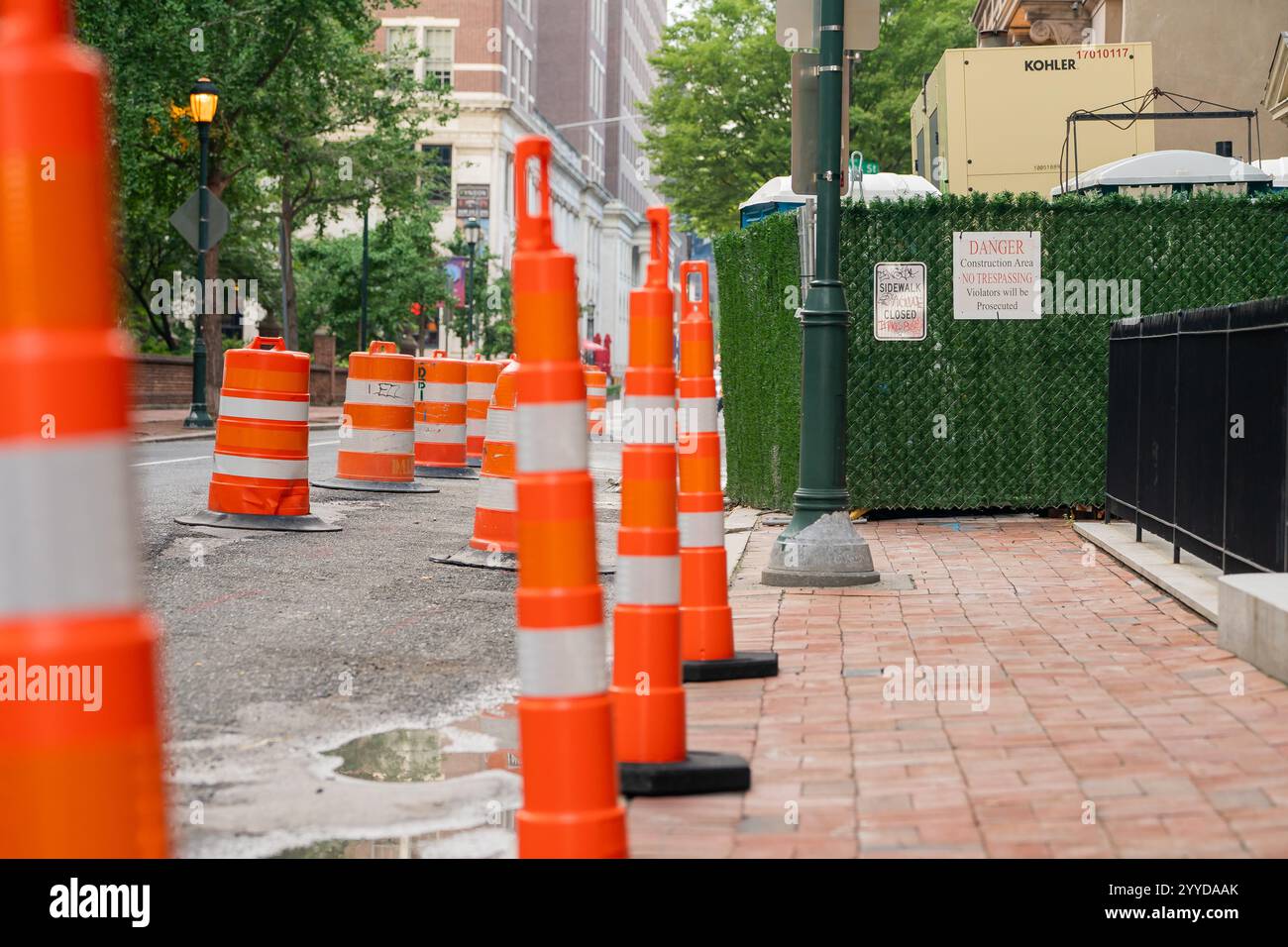 July 19 2023. Construction work blocks pedestrian access on a sidewalk ...