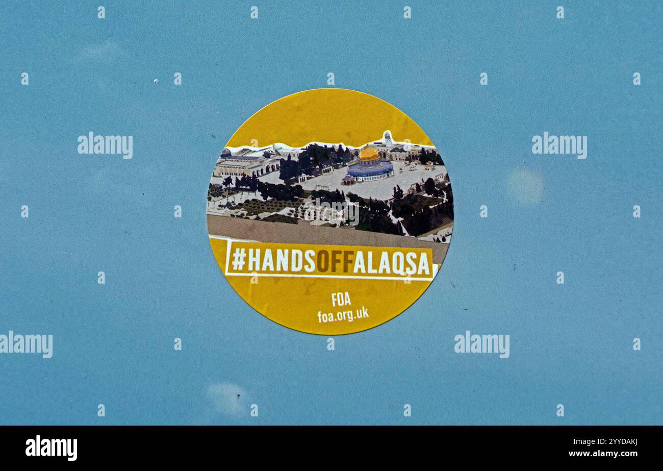A sticker issued by Friends of Al-Aqsa with the hashtag "HANDSOFFALAQSA ...