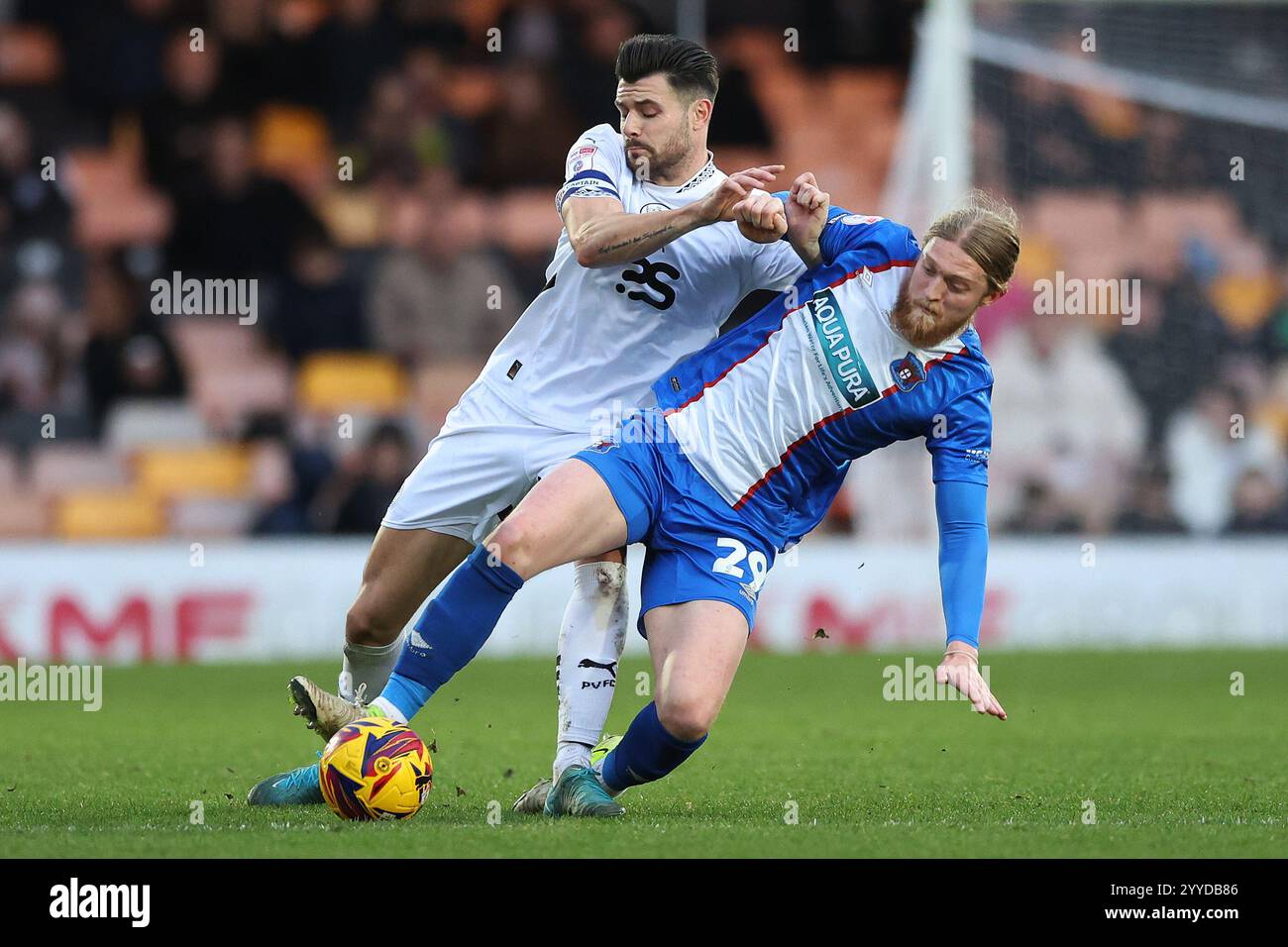 Port Vale???s Connor Hall and Carlisle United???s Luke Armstrong during ...