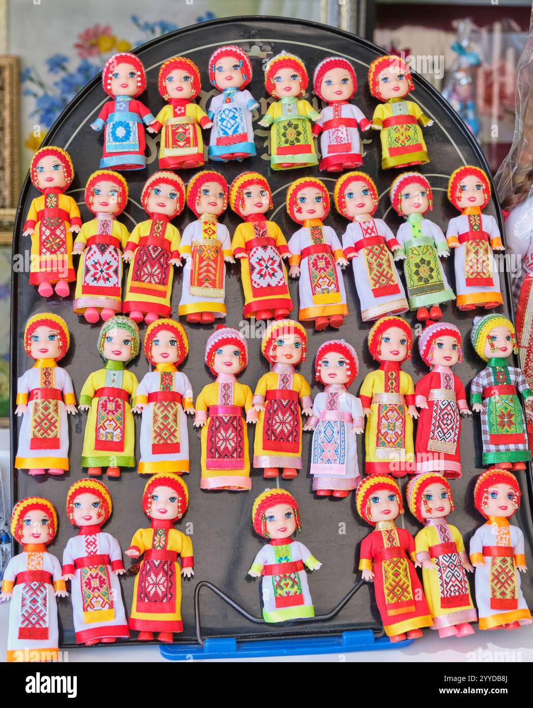 Collection of colorful handmade dolls-magnets dressed in traditional ...