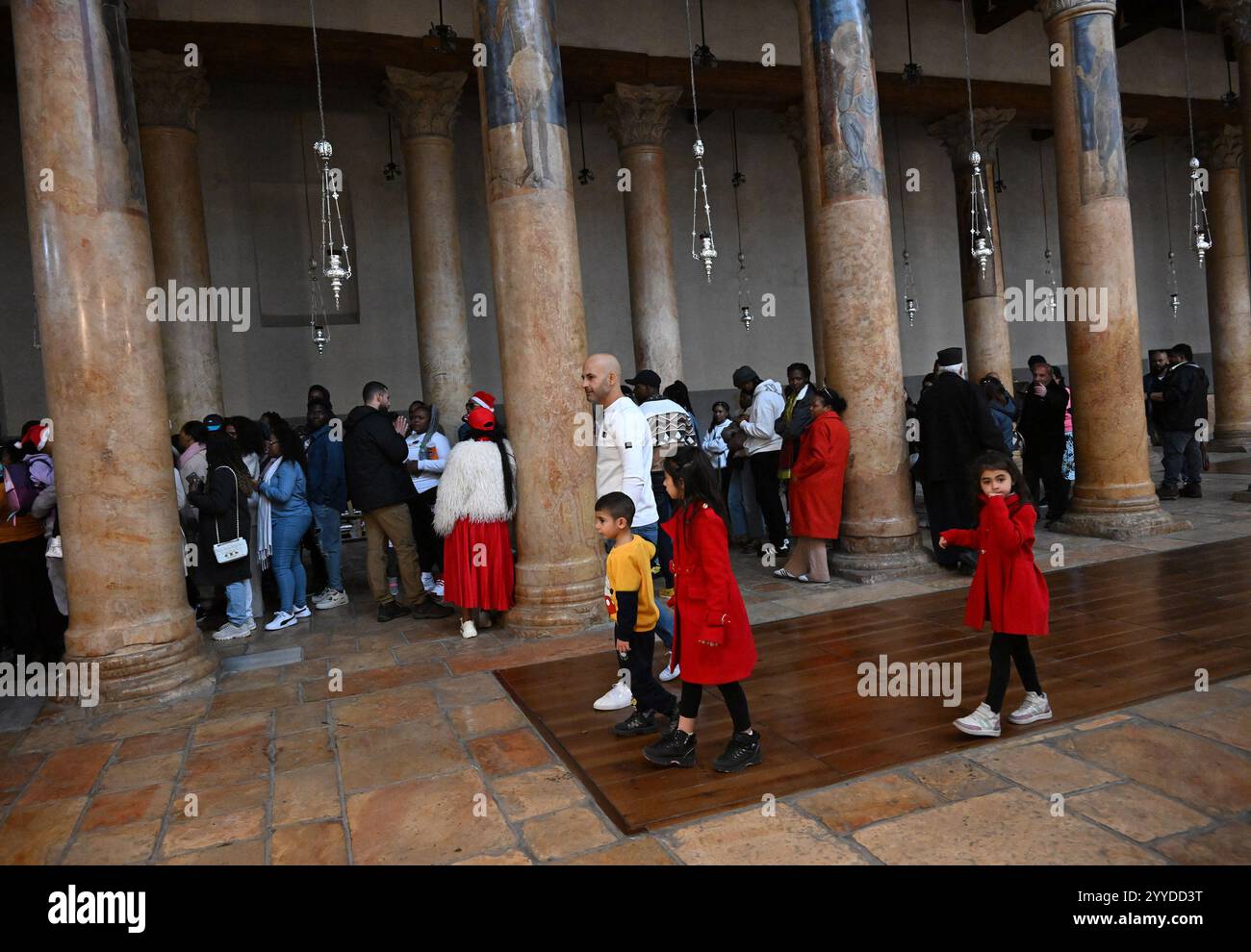 Bethlehem, West Bank. 21st Dec, 2024. People visit the Church of ...