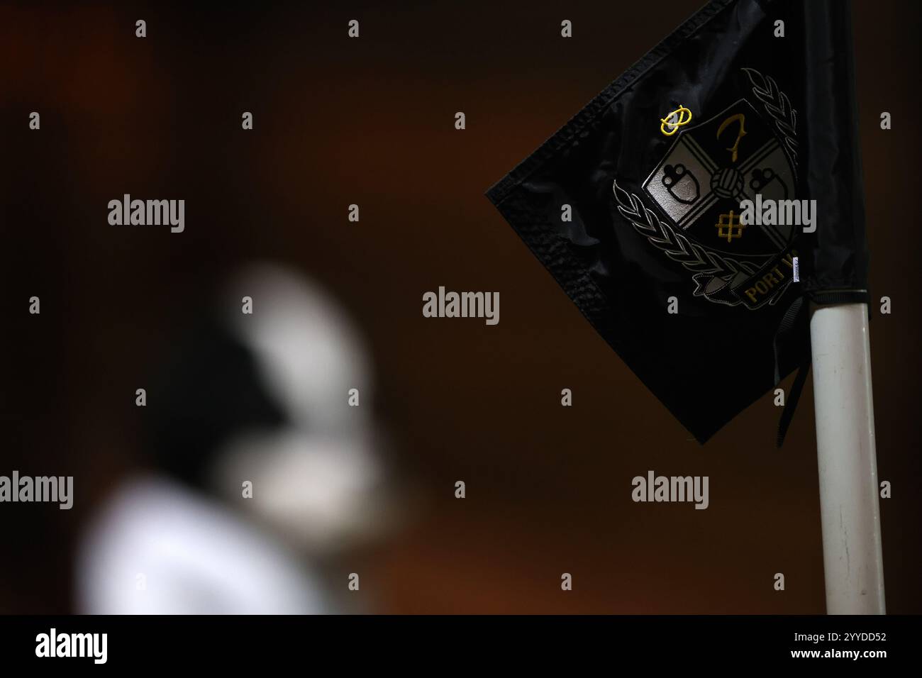 A Port Vale corner flag with Boomer the club mascot in the background ...