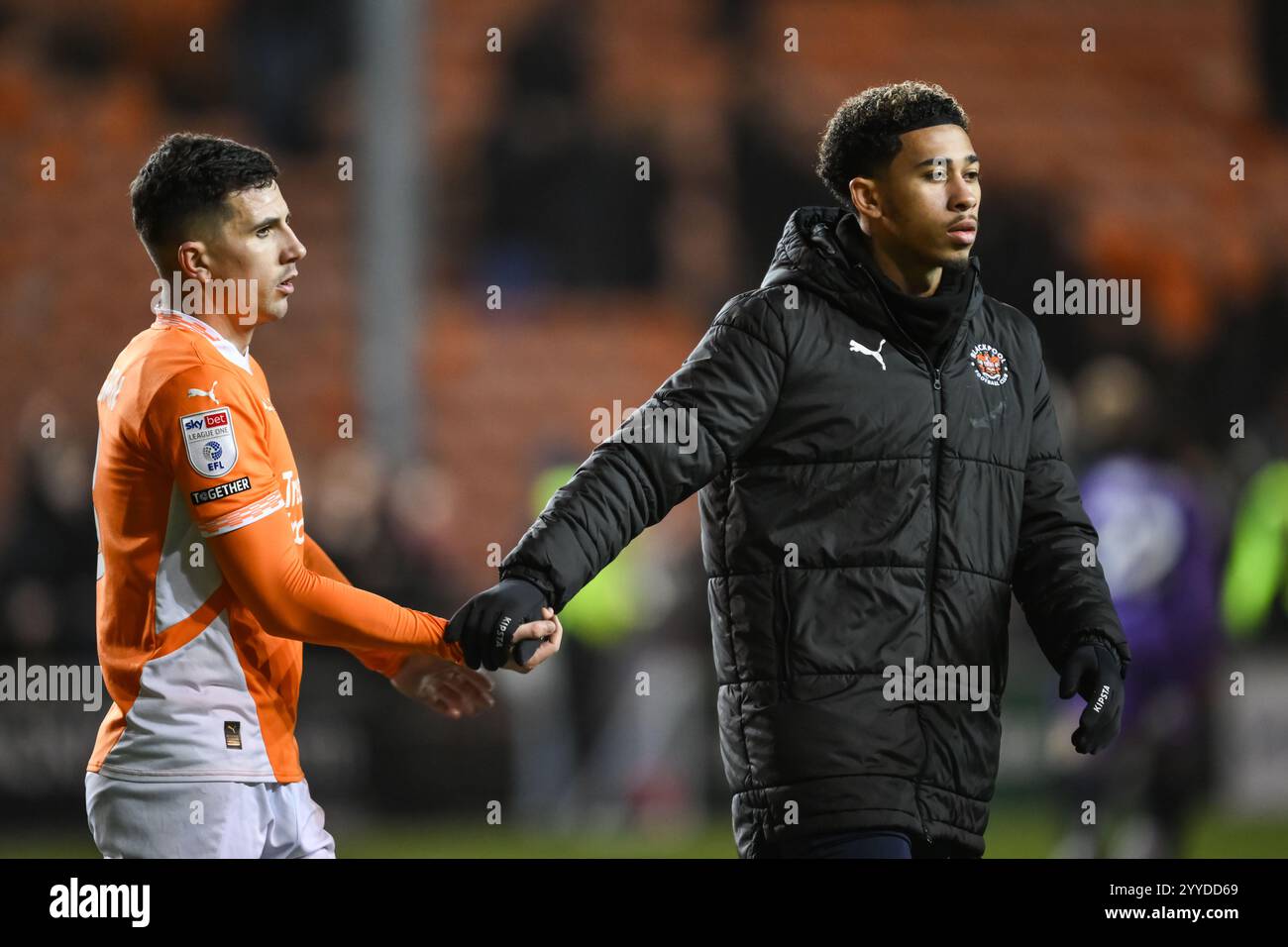 Albie Morgan and Jordan Lawrence-Gabriel of Blackpool shake hands at ...