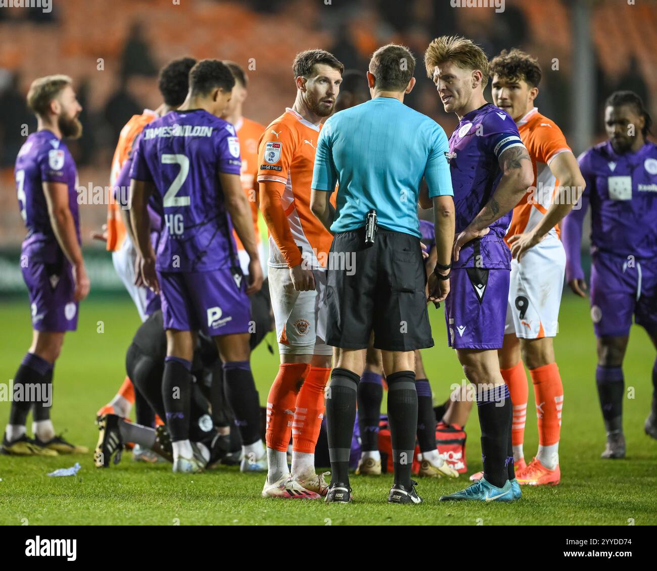 James Husband of Blackpool and Carl Piergianni of Stevenage speak to ...
