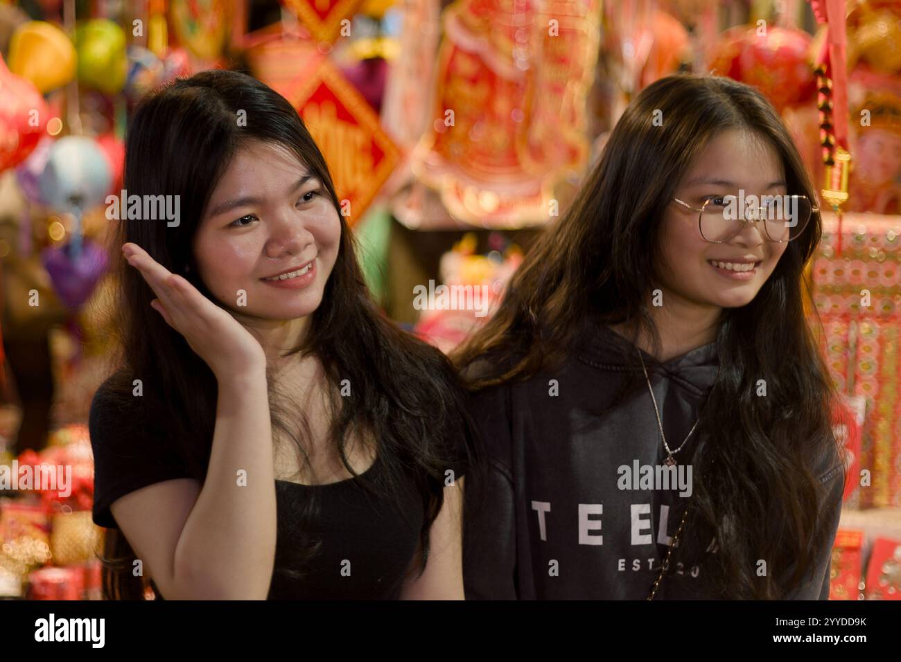 Girls taking photos on Tet Holiday - Vietnamese Lunar New Year Hano ...