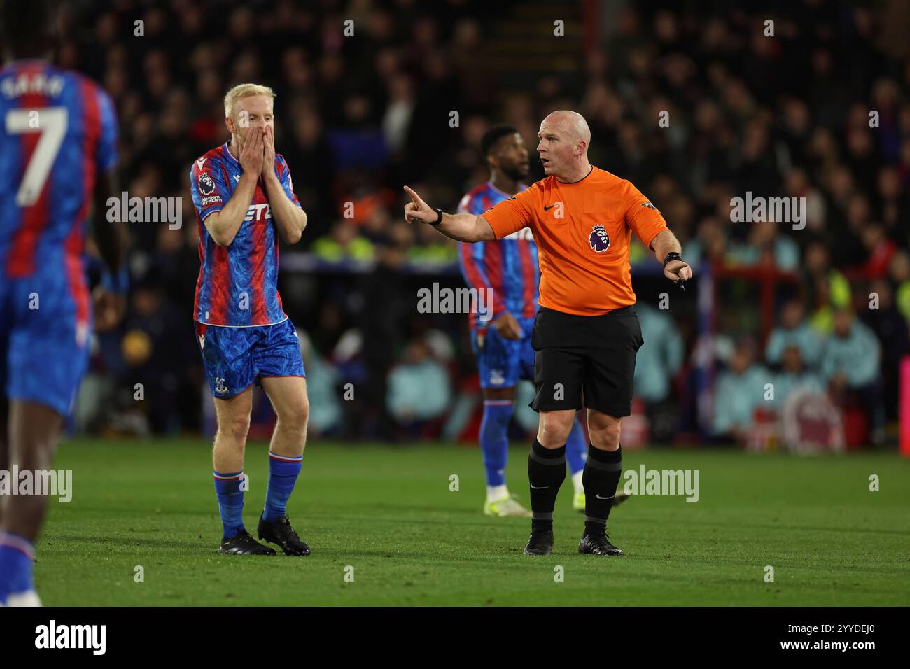 Referee Simon Hooper gestures with Crystal Palace's Will Hughes during ...