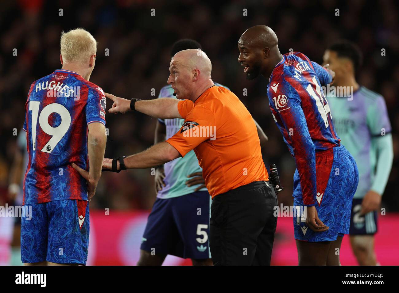 Referee Simon Hooper gestures with Crystal Palace's Will Hughes during ...