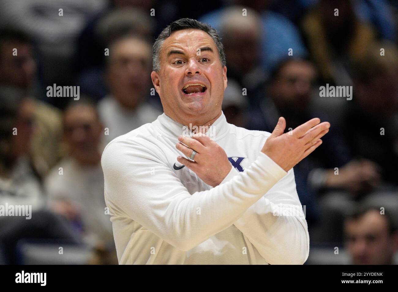Xavier head coach Sean Miller gestures during the first half of an NCAA ...
