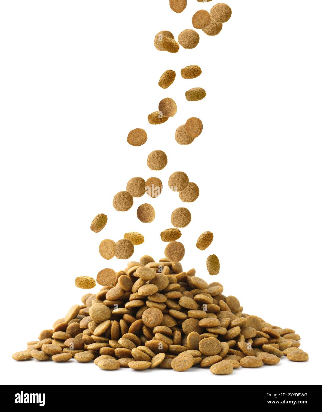 Dry pet food falling onto heap on white background Stock Photo - Alamy