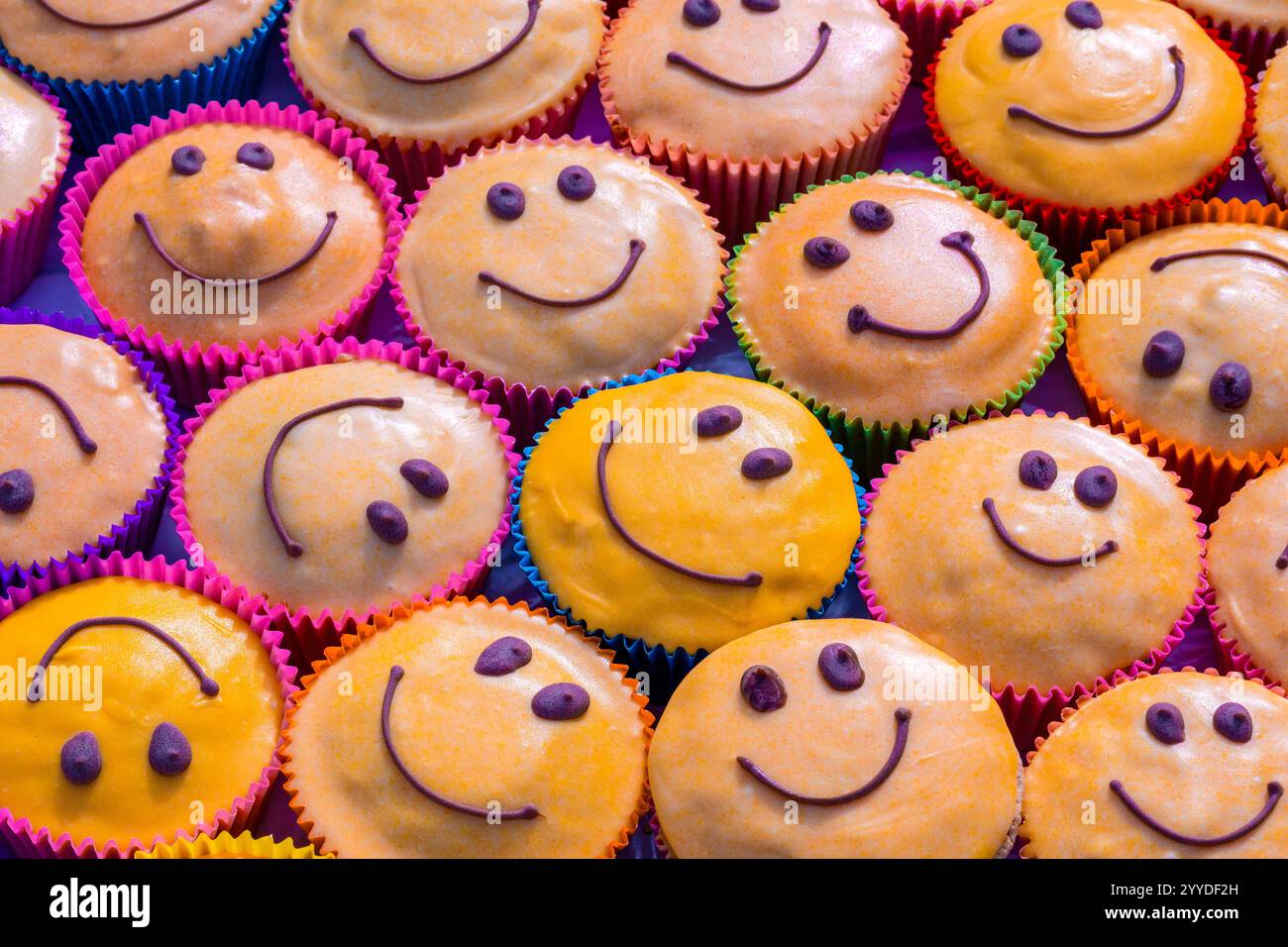 Smiley faces. smile cakes on table. The concept teamwork, friends ...