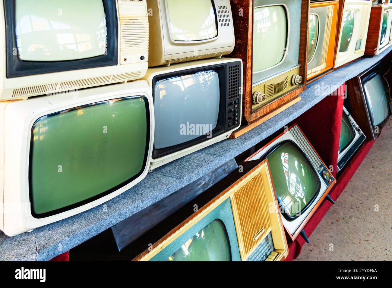 Many retro television. vintage old TV is colorful multi-row. Seeing the ...