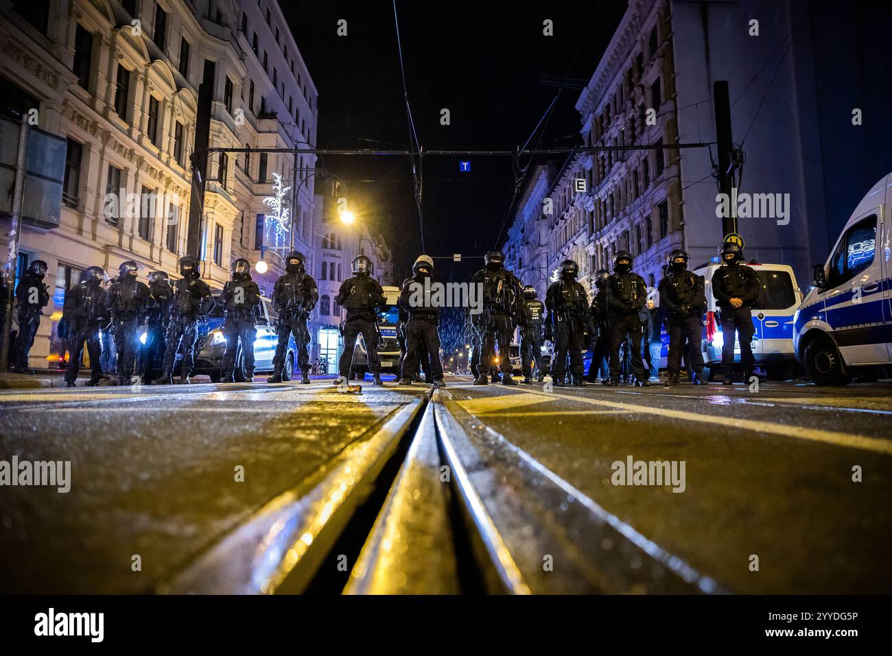 21 December 2024, Saxony-Anhalt, Magdeburg: Police officers secure a ...