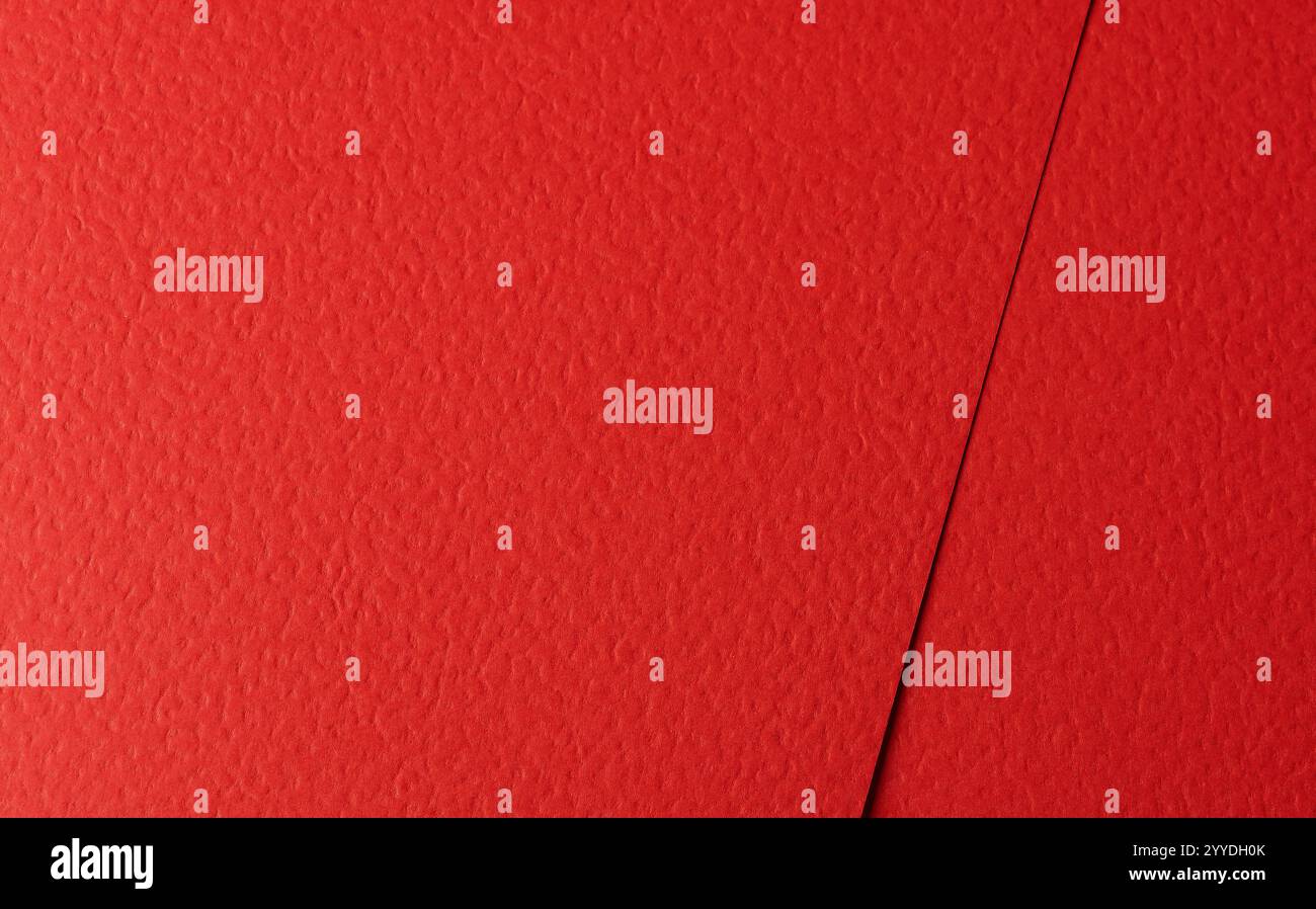 Bright scarlet paper texture with a grainy, perforated surface and deep ...
