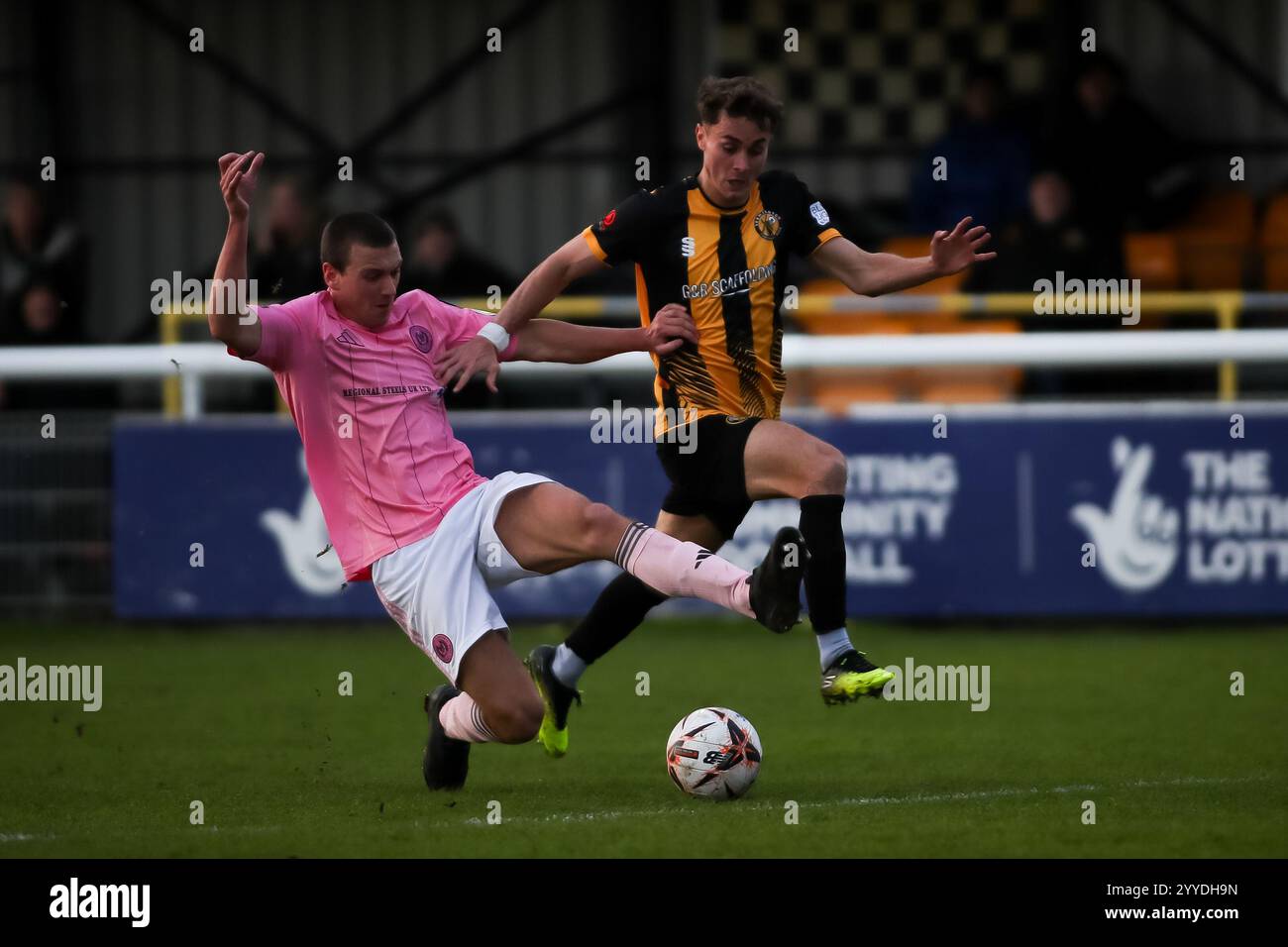 Dan Turner gets tackled by Marcus Poscha during the National League ...