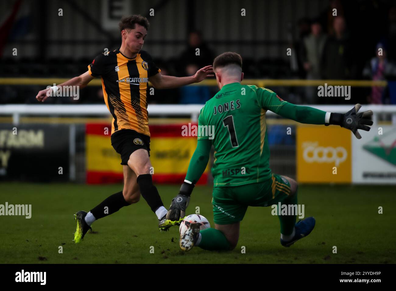 Dan Turner takes a shot against Curzon Ashton goalkeeper Bobby Jones ...