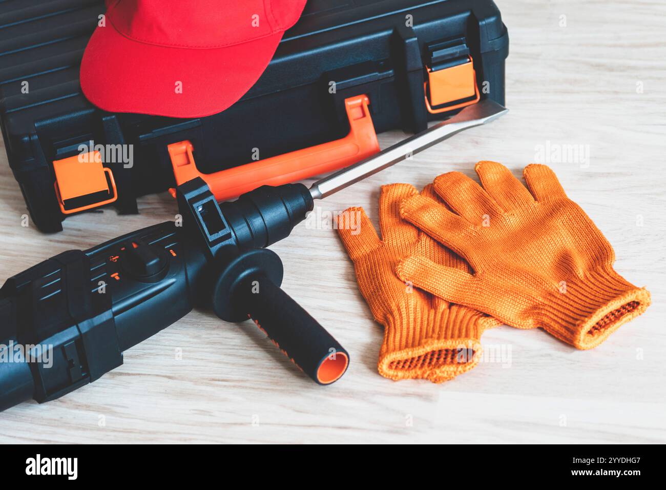 Top view of Working tools.rotary hammer, tool box, work cap, gloves ...
