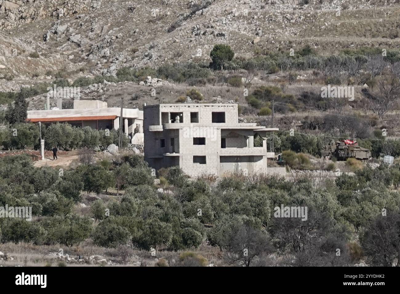 Majdal Shams, Israel. 20th Dec, 2024. IDF armored vehicles are viewed ...