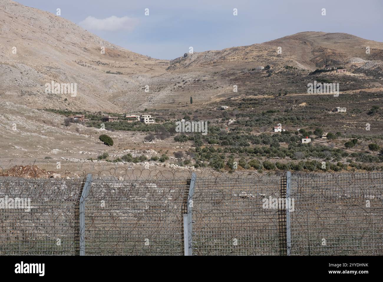 Majdal Shams, Israel. 20th Dec, 2024. A view of the Israeli fence on ...