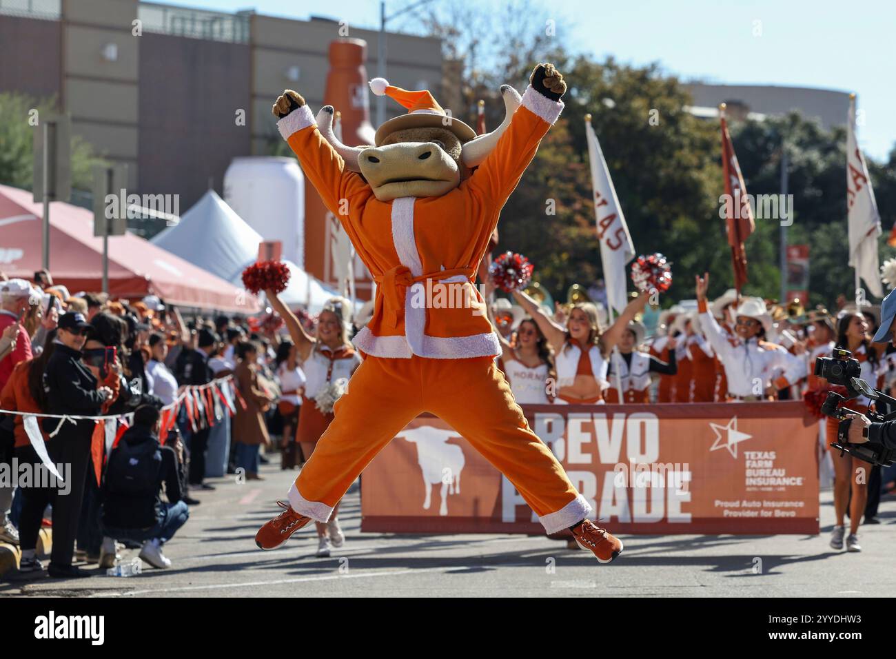AUSTIN, TX - DECEMBER 21: Hook 'Em the mascot jumps in the air in the ...