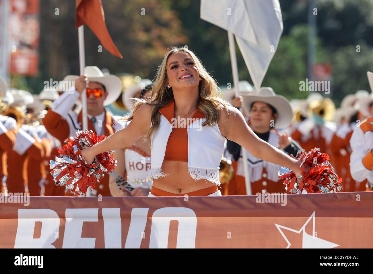 AUSTIN, TX - DECEMBER 21: A Texas cheerleader leads the band into the stadium before the CFP ...
