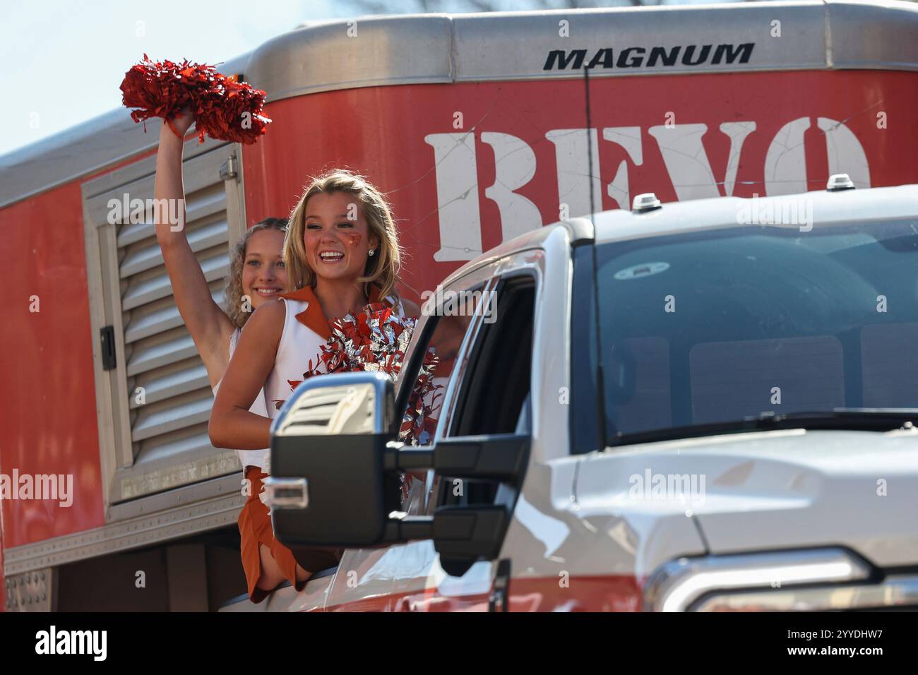 AUSTIN, TX - DECEMBER 21: Texas cheerleaders sit on the back of the ...