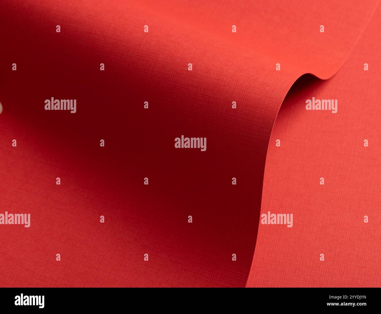 Rich ruby red paper texture with a crosshatch pattern and fine embossed ...