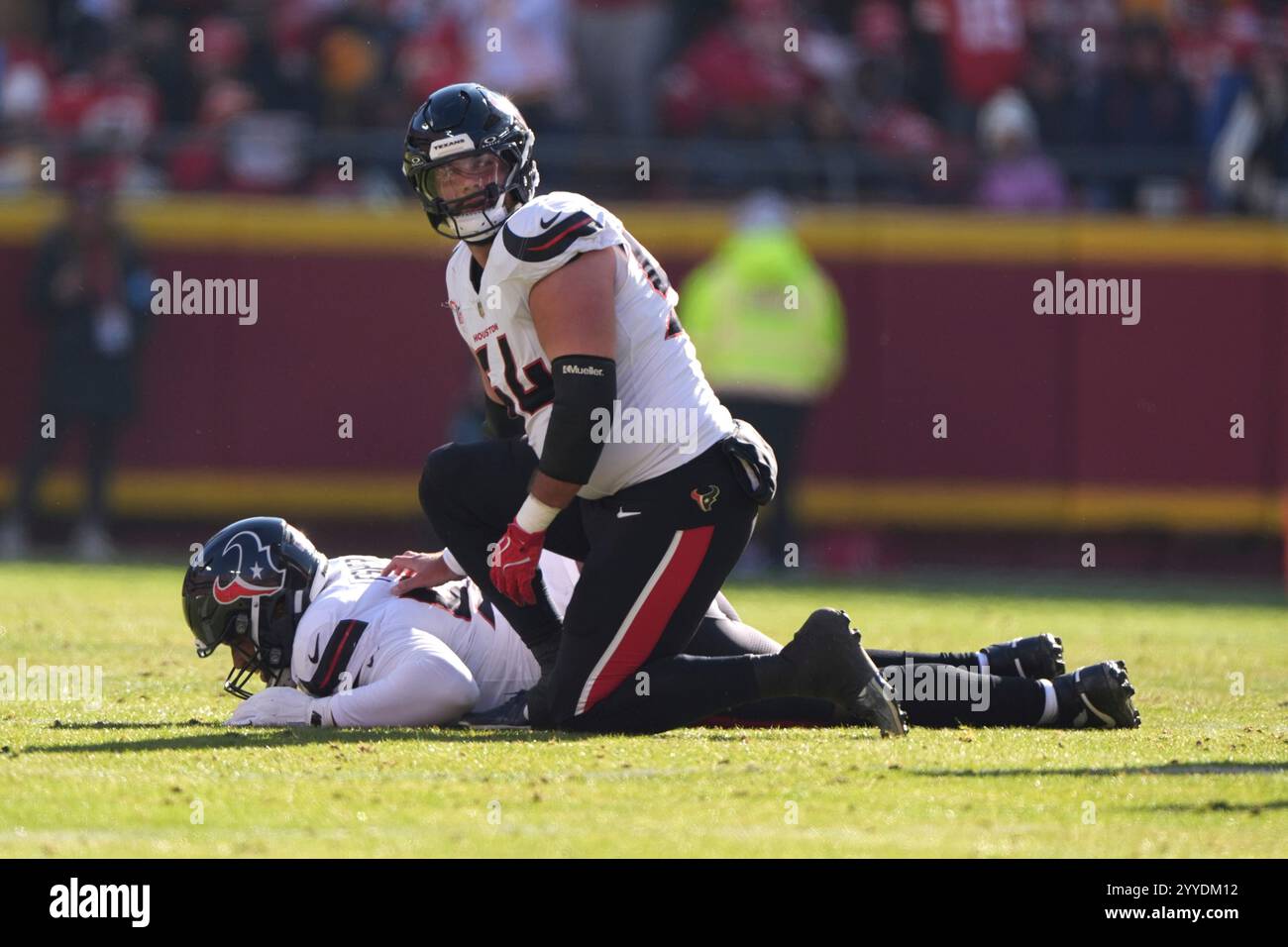 Houston Texans Jarrett Patterson, top, checks on teammate tackle Blake ...