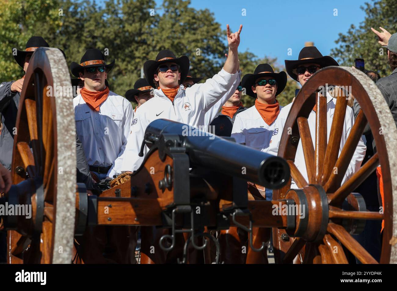 AUSTIN, TX - DECEMBER 21: The Texas Cowboys roll Smokey the Cannon into ...