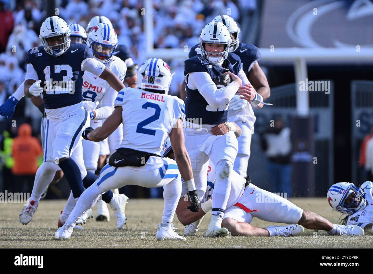 Penn State quarterback Drew Allar (15) looks to elude SMU safety ...