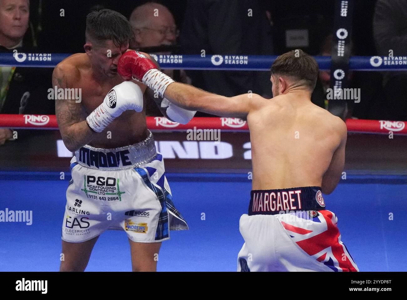 Boxers Isaac Lowe, right, and Lee McGregor compete during their WBC ...