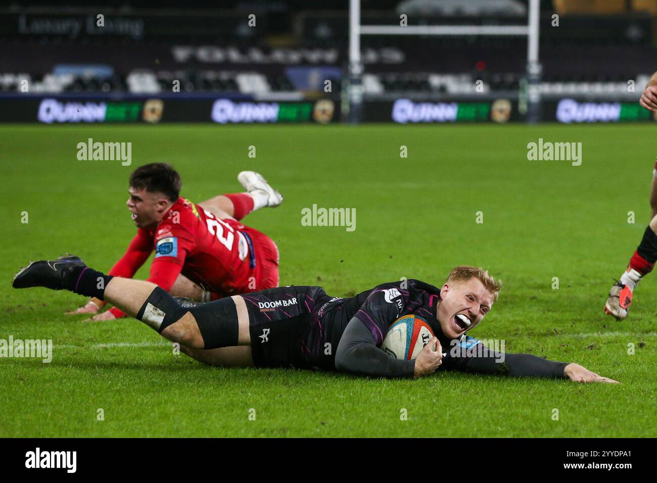 Swansea, UK. 21 December, 2024. Iestyn Hopkins of Ospreys scores the ...