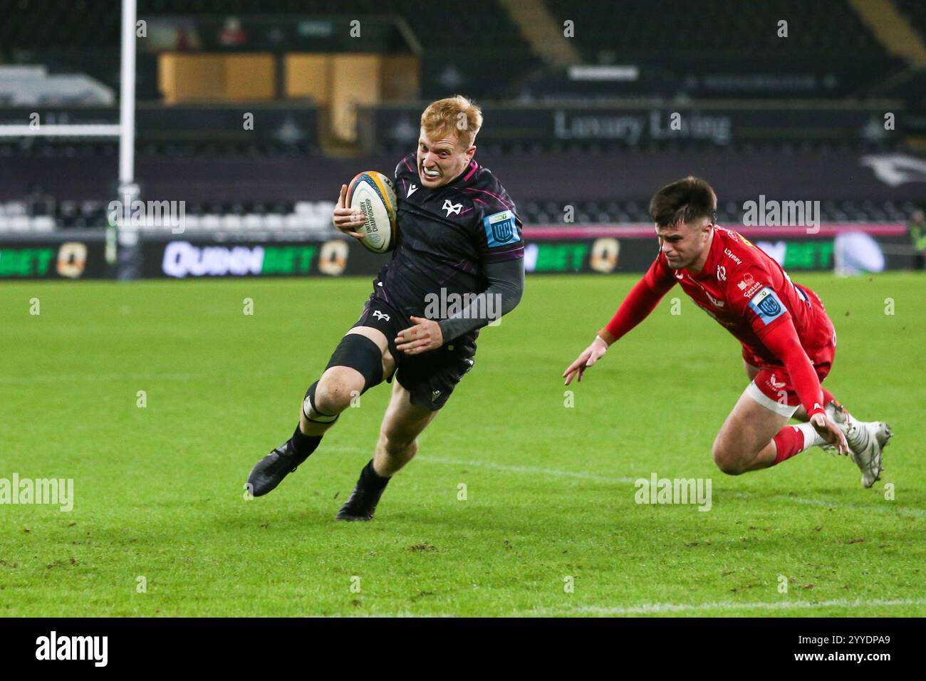 Swansea, UK. 21 December, 2024. Iestyn Hopkins of Ospreys runs in to ...