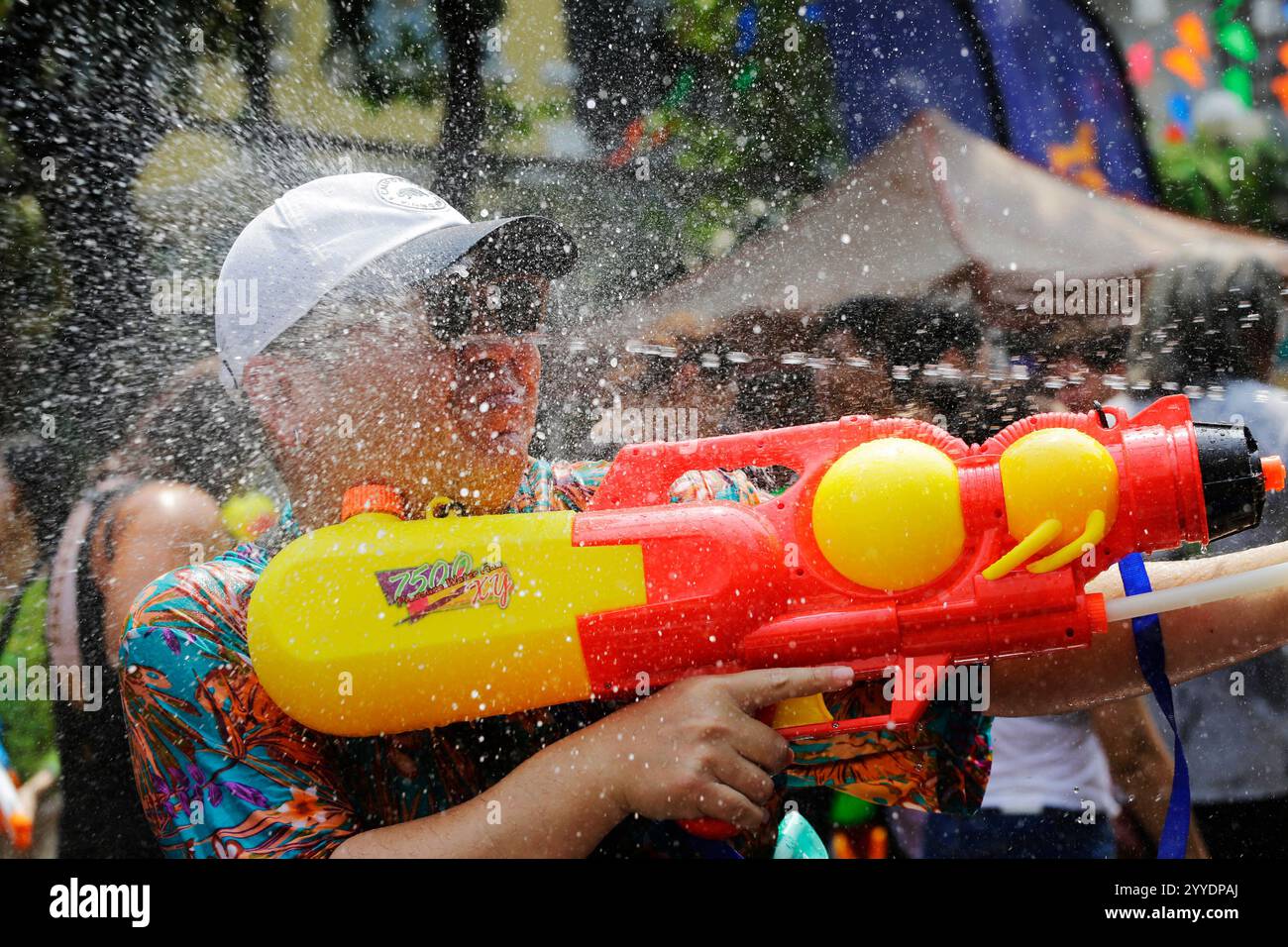 Bangkok, Thailand - April 13, 2023: Revelers splash water in each other ...