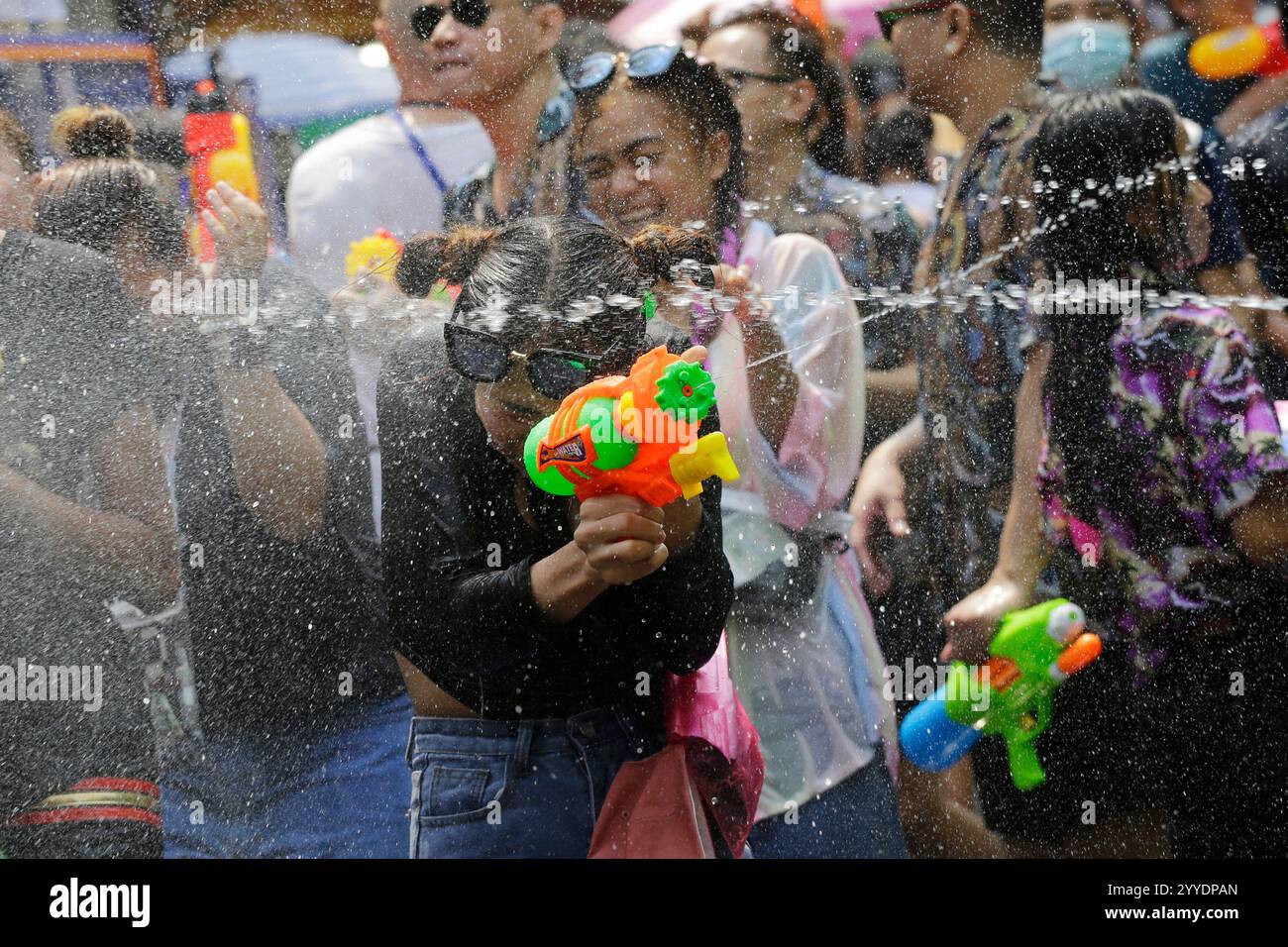 Bangkok, Thailand - April 13, 2023: People splash water in each other ...