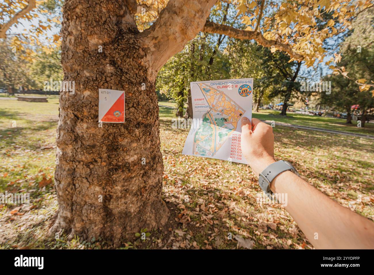 22 September 2024, Belgrade, Serbia: Man with a map in hand, standing ...